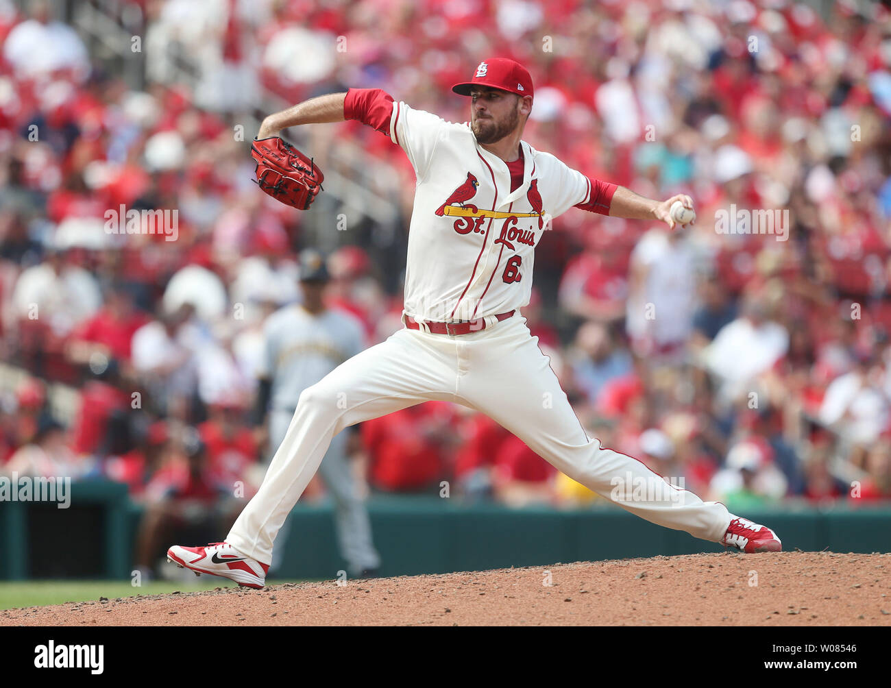 St. Louis Cardinals pitcher Austin Gomber delivers a pitch to the ...