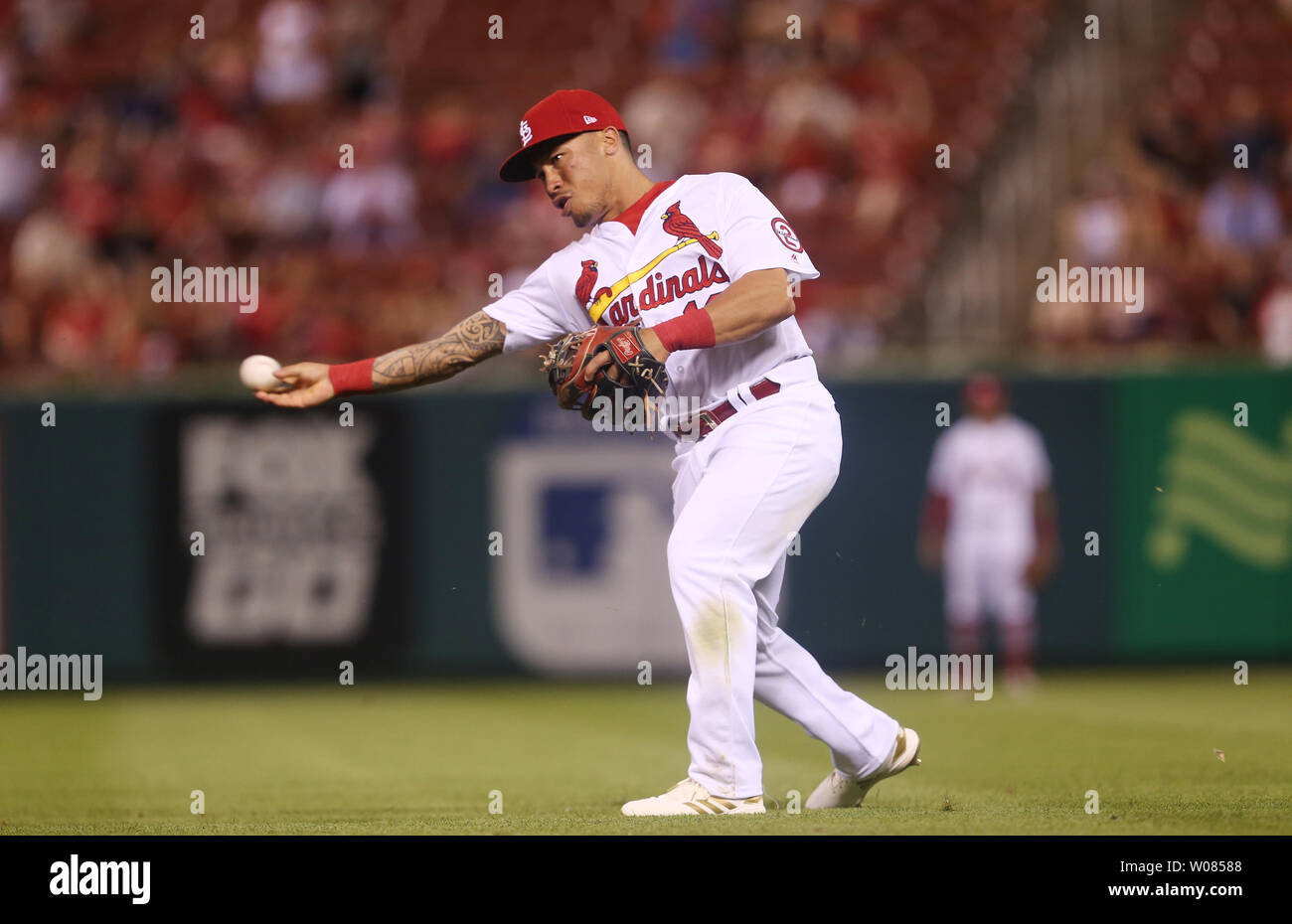 St. Louis Cardinals Kolton Wong makes the play to first base to get San ...