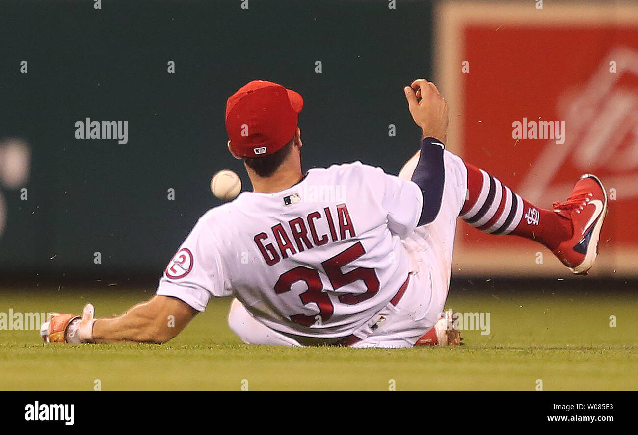 St. Louis Cardinals Greg Garcia cant make the catch on a ball off the ...