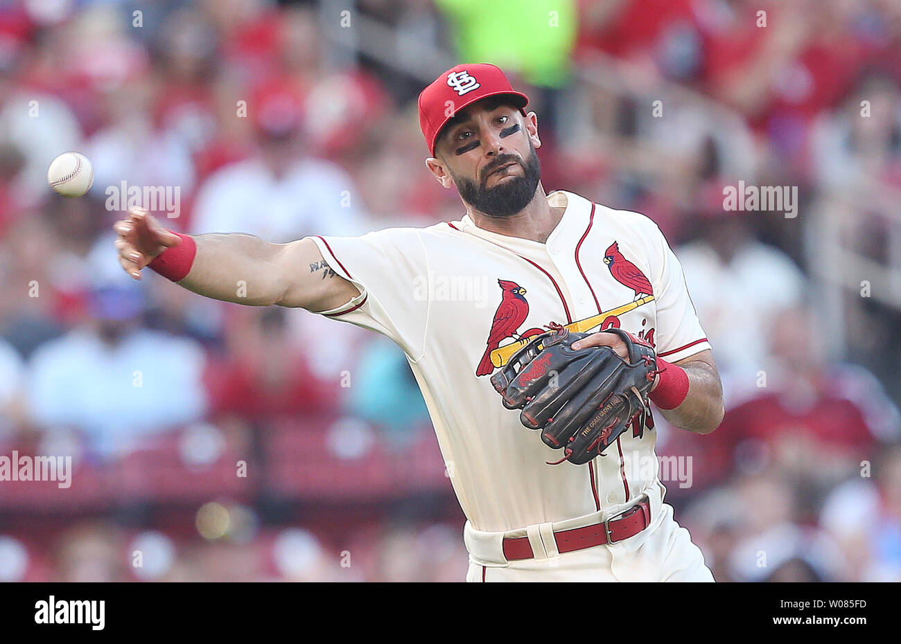 St. Louis Cardinals Matt Carpenter throws the baseball to first base ...