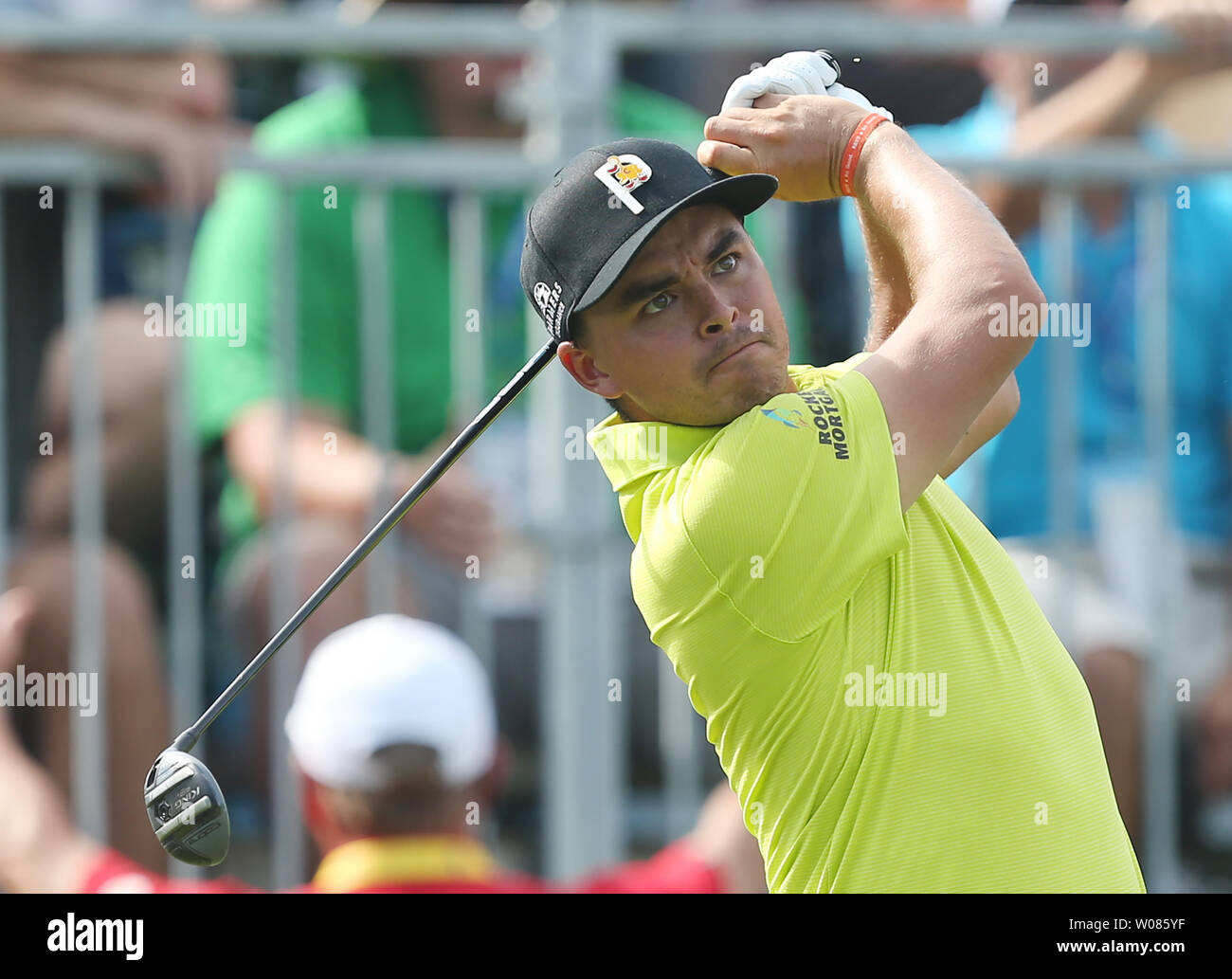 PGA golfer Rickie Fowler watches his tee shot on the first hole at the ...