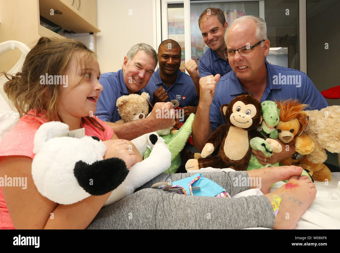 Major League umpires (L to R) Mike Winters, Alan Porter, Jansen ...