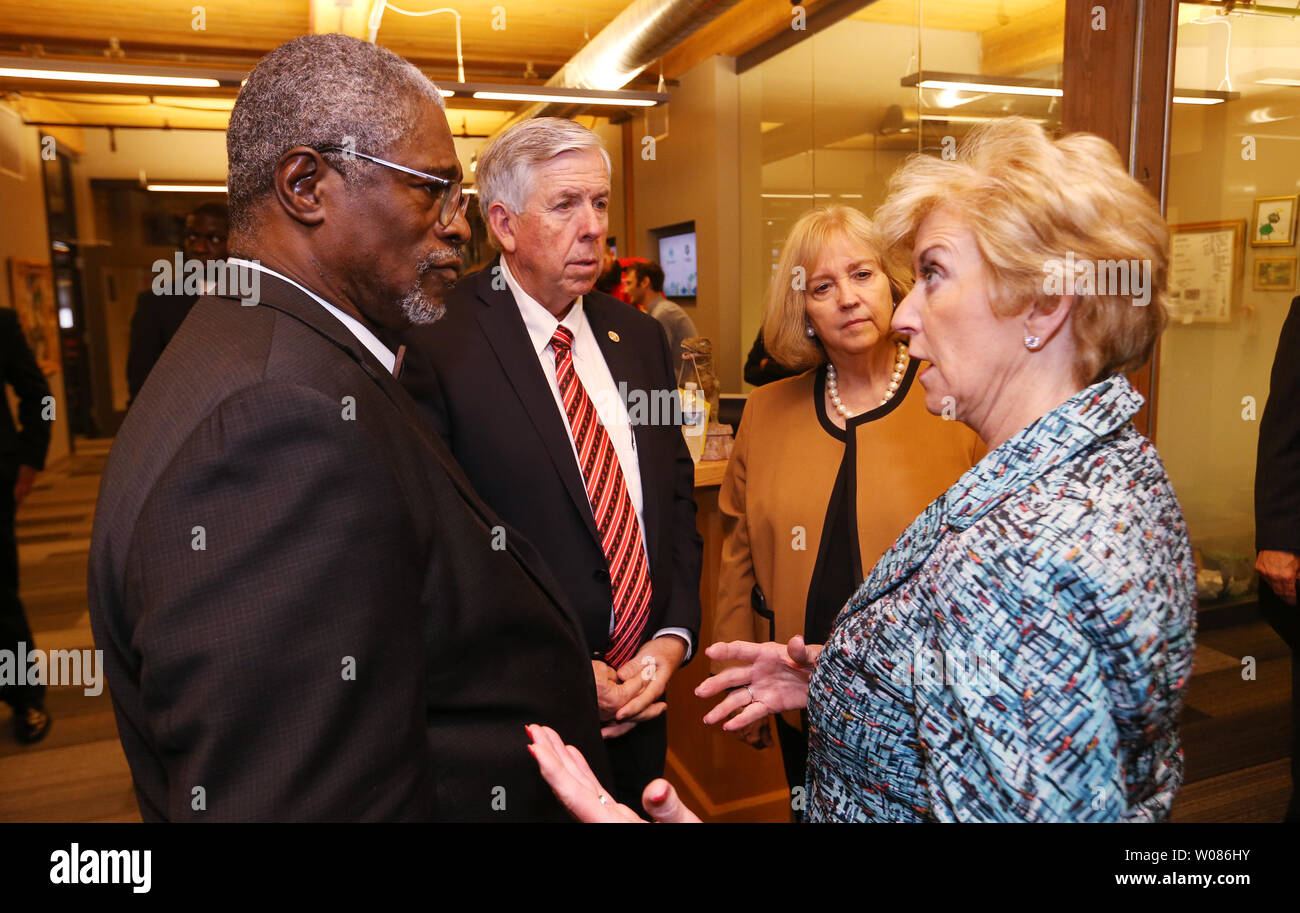 ( L to R) Kansas City Mayor Sly James, Missouri Governor Mike Parson ...
