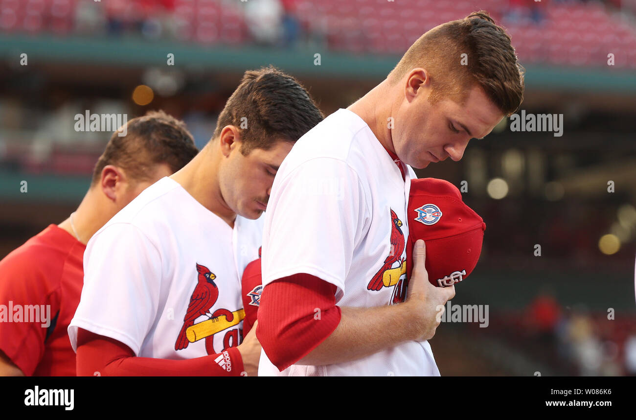 St. Louis Cardinals pitcher Tyler Webb (R) and others pay their ...