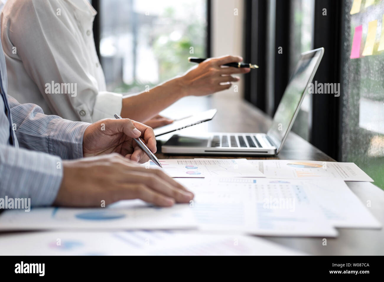 Businessman accountant and secretary making working audit and ...