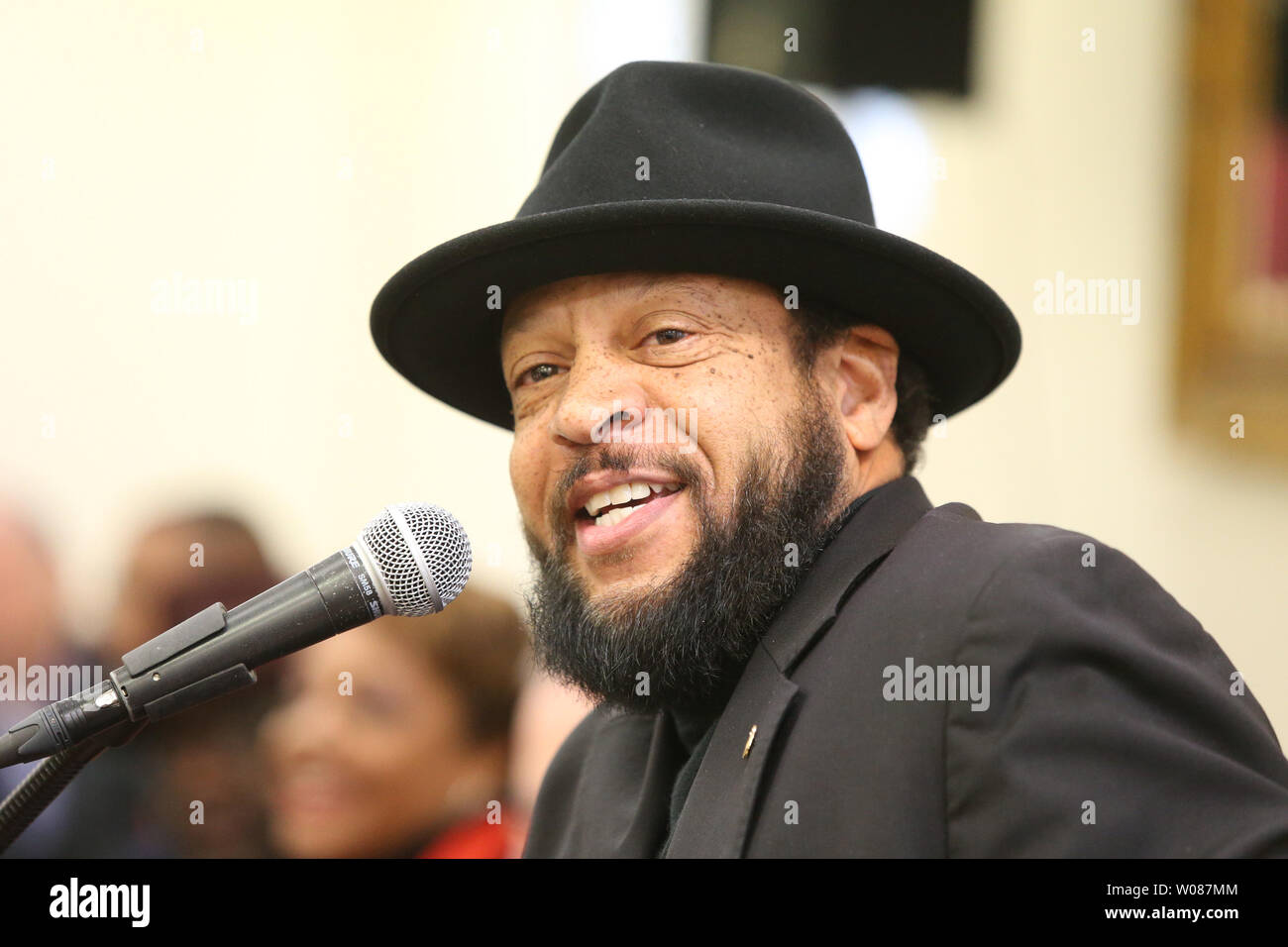 Comedian Eric Rhone makes his remarks for friend Cedric Antonio Kyles ...