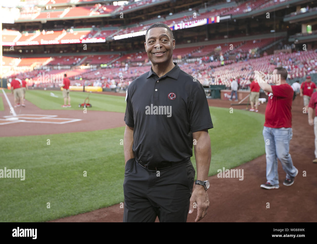 Former NFL player Marcus Allen walks the track before the Los Angeles ...
