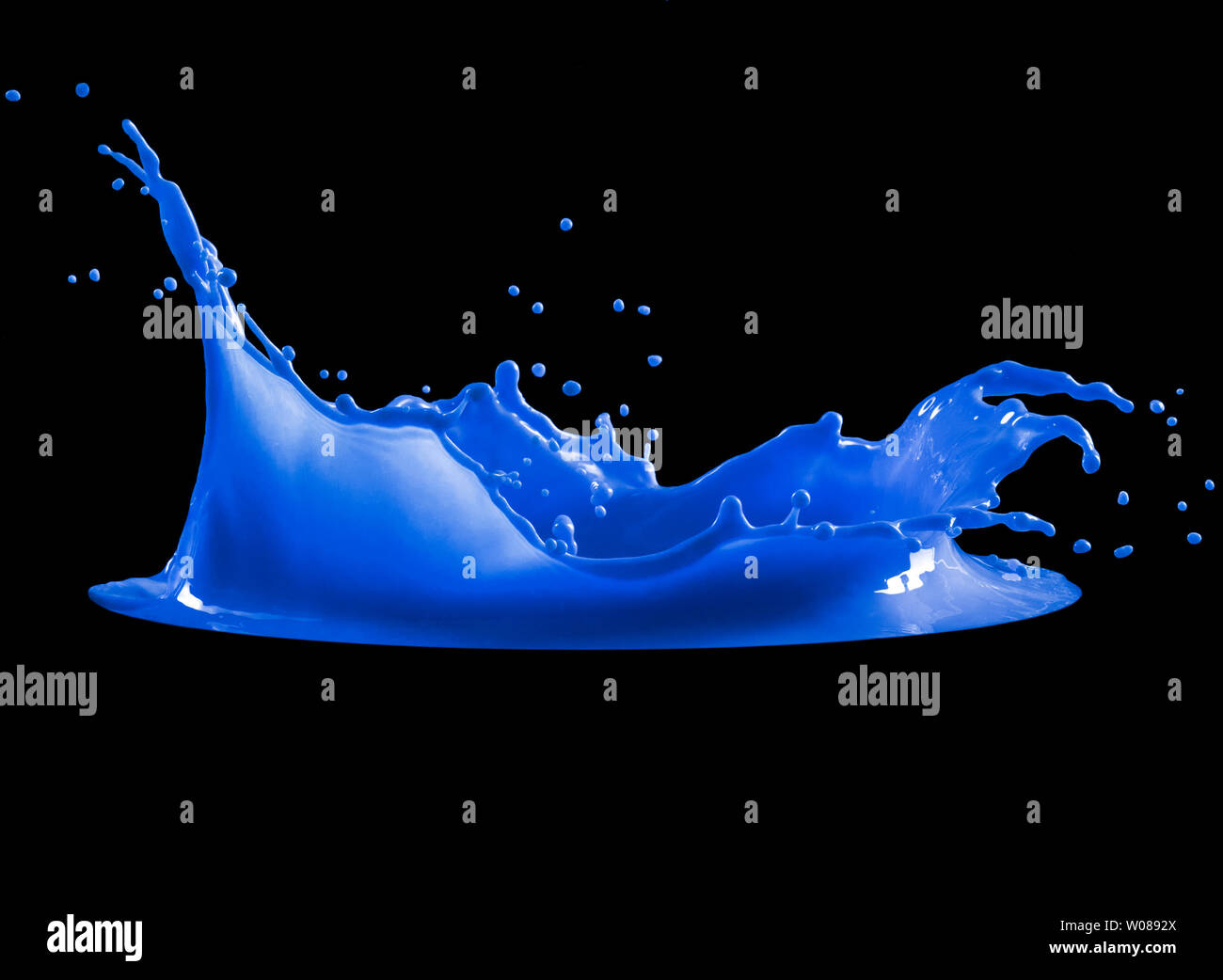 dark blue paint splash isolated on black background Stock Photo - Alamy