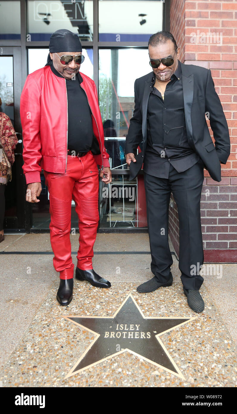 The Isley Brothers, Ernie Isley (L) and Ronald Isley look at their new ...
