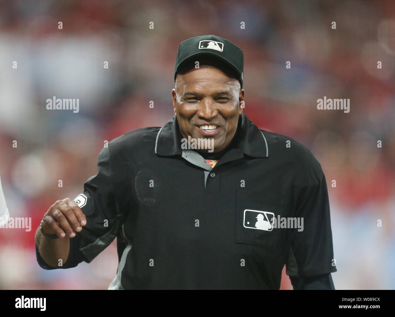 Home Plate umpire Laz Diaz has a laugh between innings of the St. Louis ...