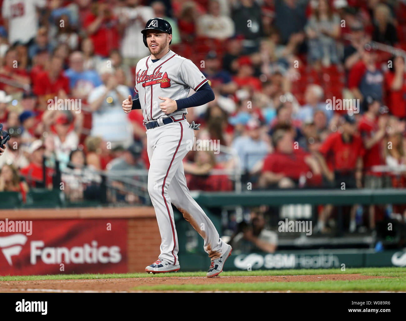 Atlanta Braves Freddie Freeman smiles at teammate Brian McCann as he ...