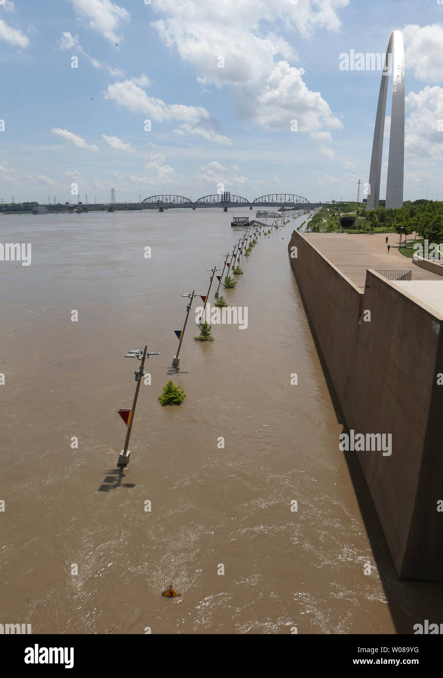 Flood waters take over Leonore K. Sullivan Blvd. near the Gateway Arch ...