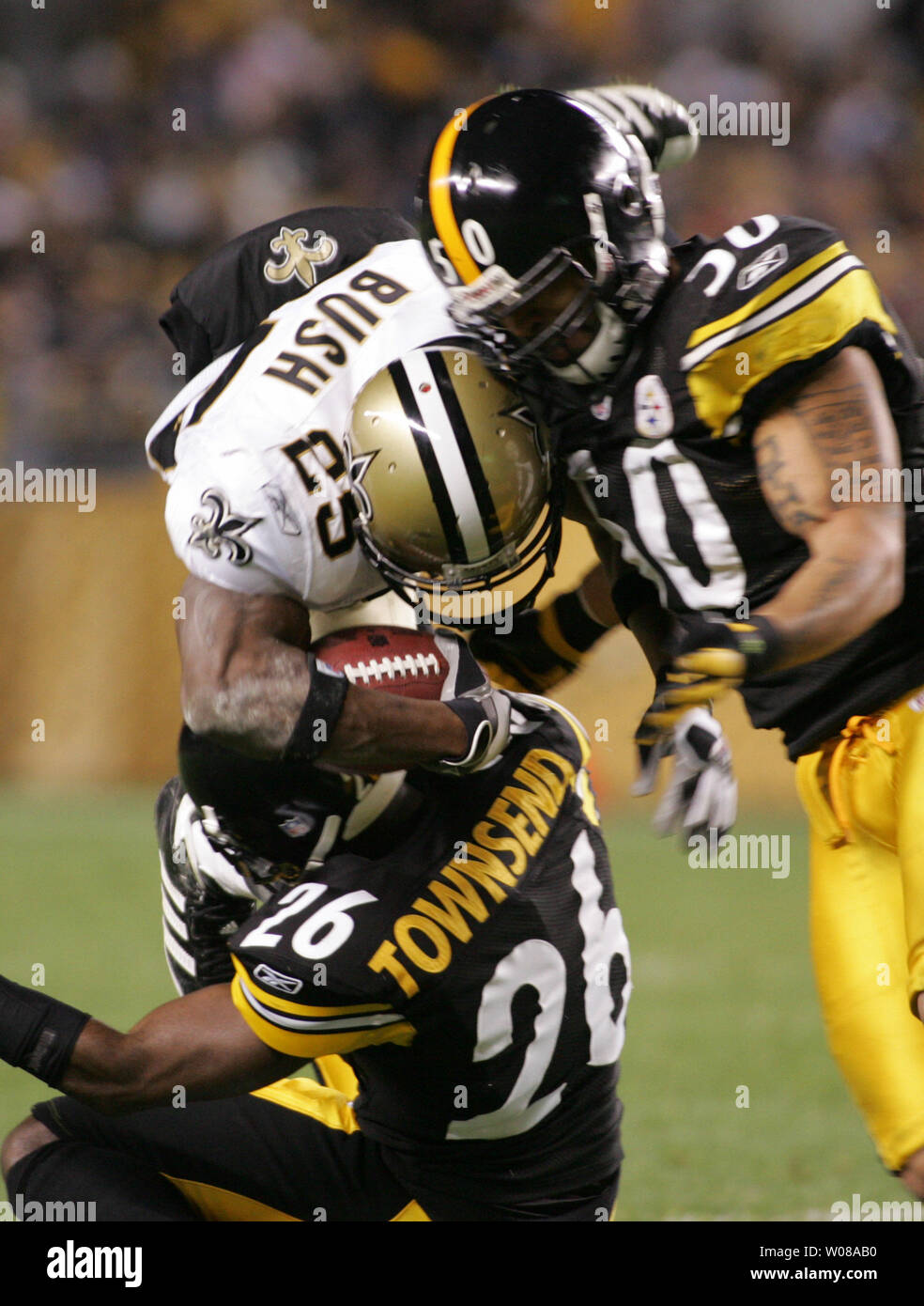 Pittsburgh Steelers Deshea Townsend (26) and Larry Foote (50) bring ...