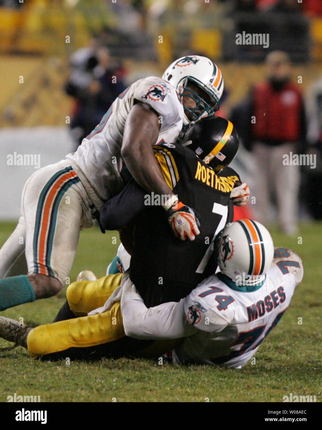 Miami Dolphins Joey Porter and Quentin Moses bring down Pittsburgh ...
