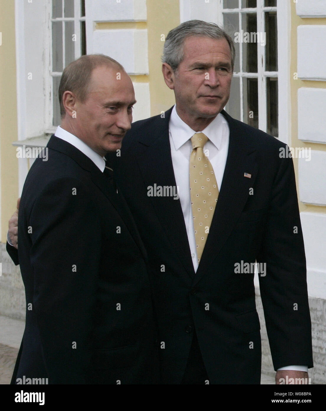 Russian President Vladimir Putin (L) welcomes U.S. President George W ...