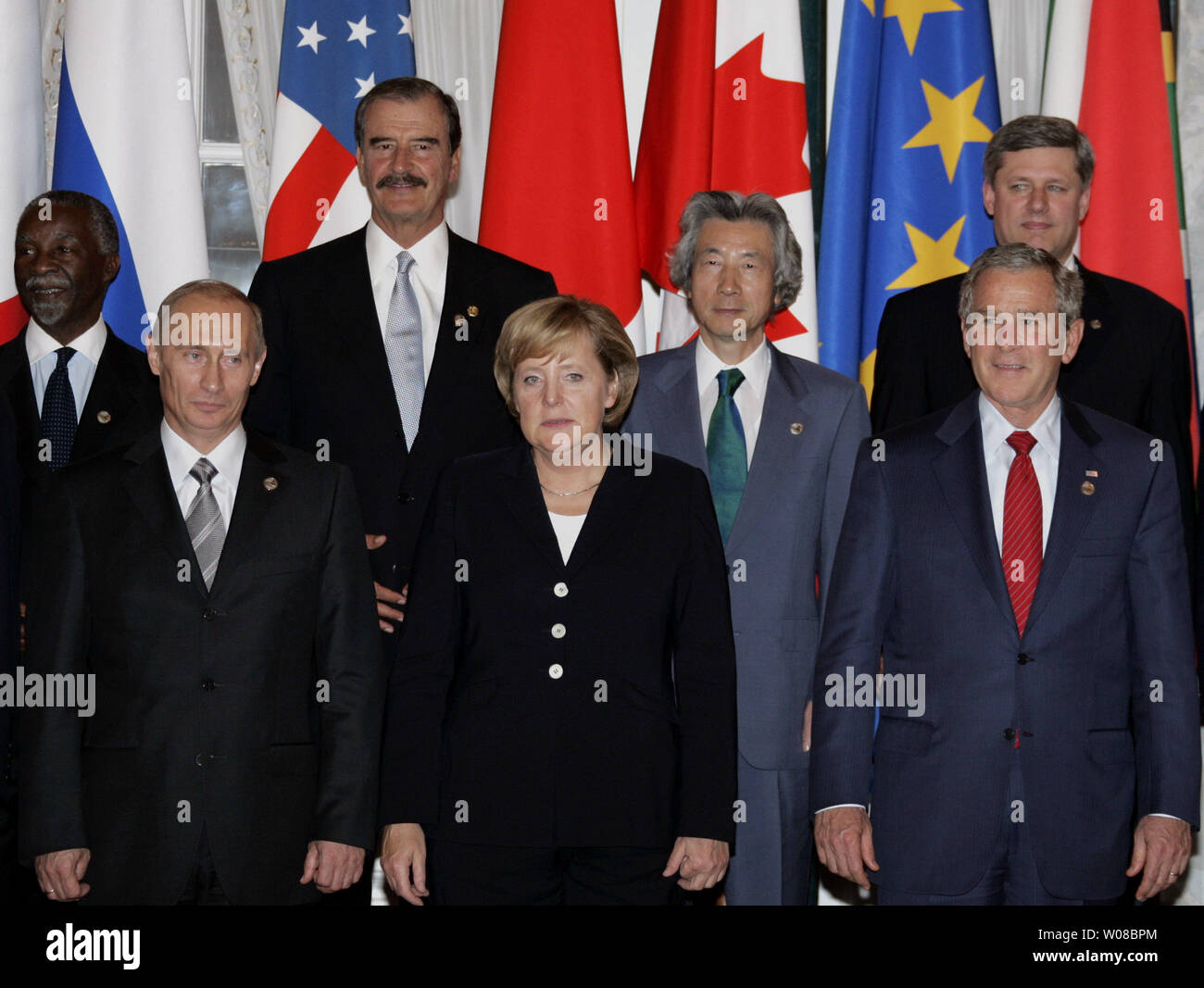 Russian president vladimir putin from left top german chancellor angela ...