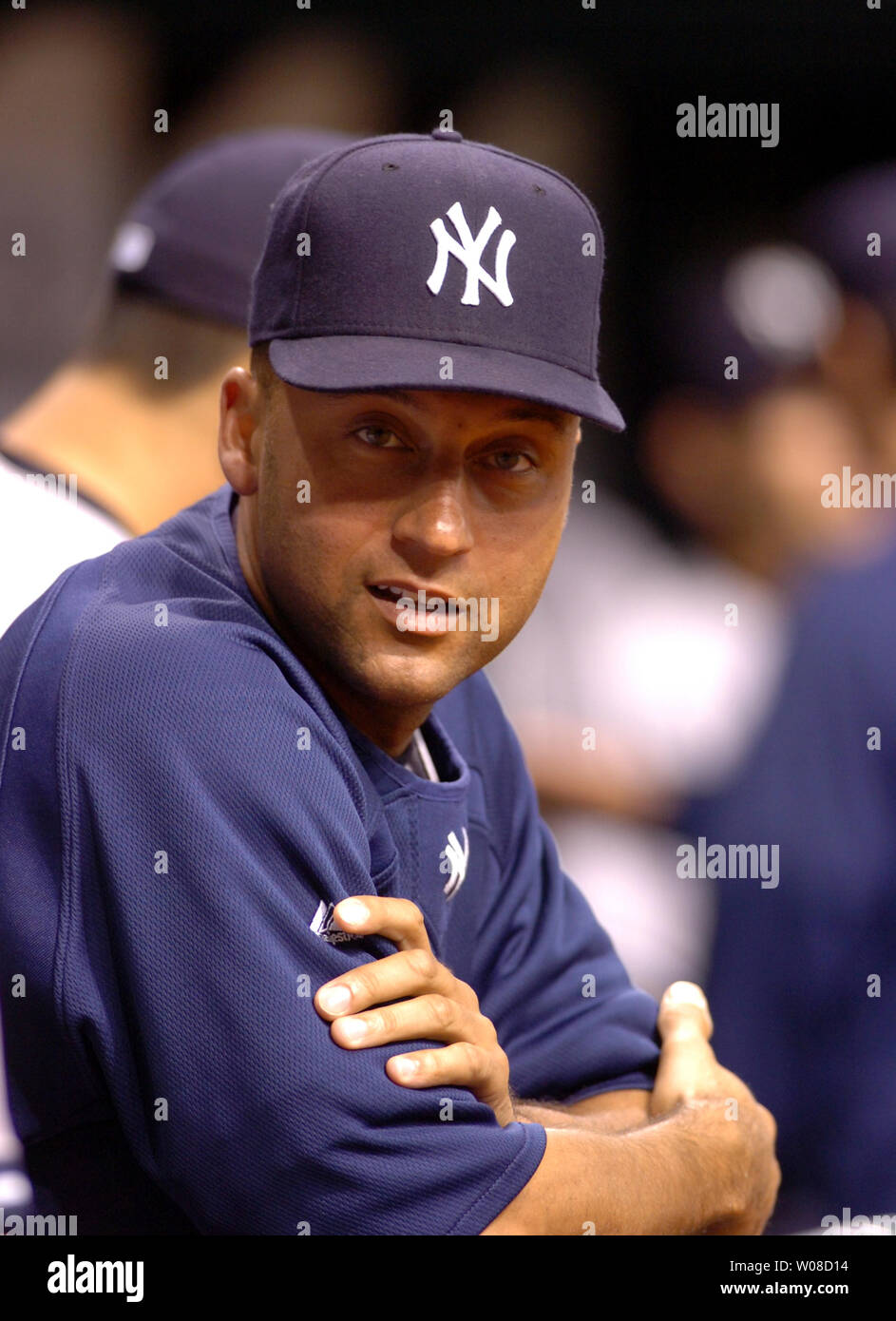 New York Yankees' Derek Jeter watches from the dugout in a game against ...