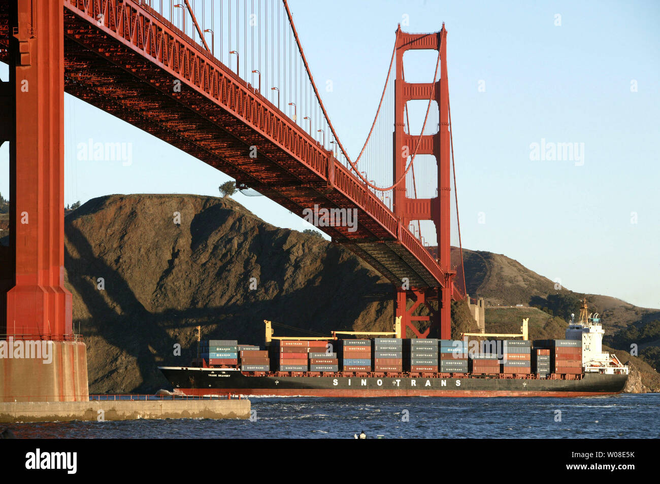The German freighter Travel Bravery sails under the Golden Gate Bridge ...
