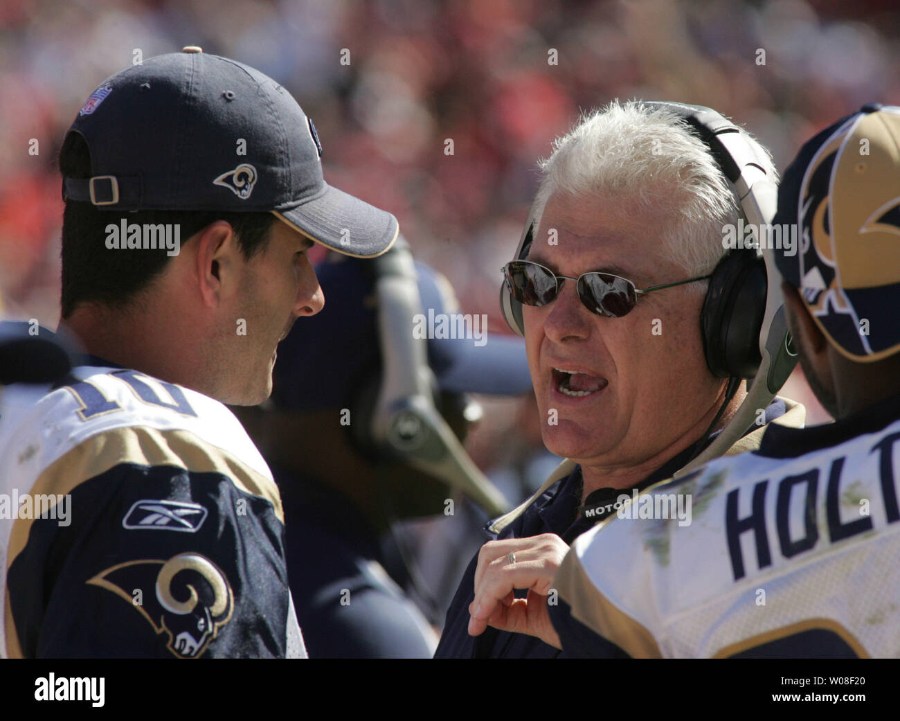 St. Louis Rams Head Coach Mike Martz talks with QB Marc Bulger during ...
