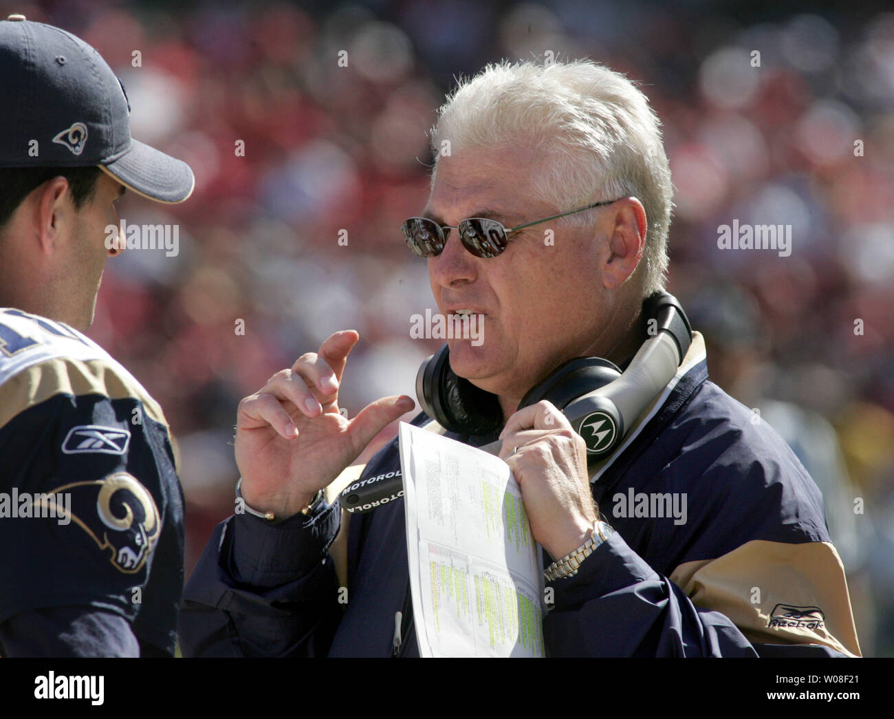 St. Louis Rams Head Coach Mike Martz talks with QB Marc Bulger during ...