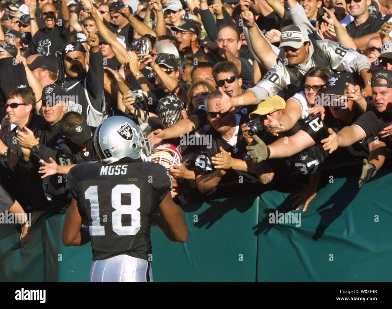 Oakland Raiders new wide receiver Randy Moss greats the fans before ...