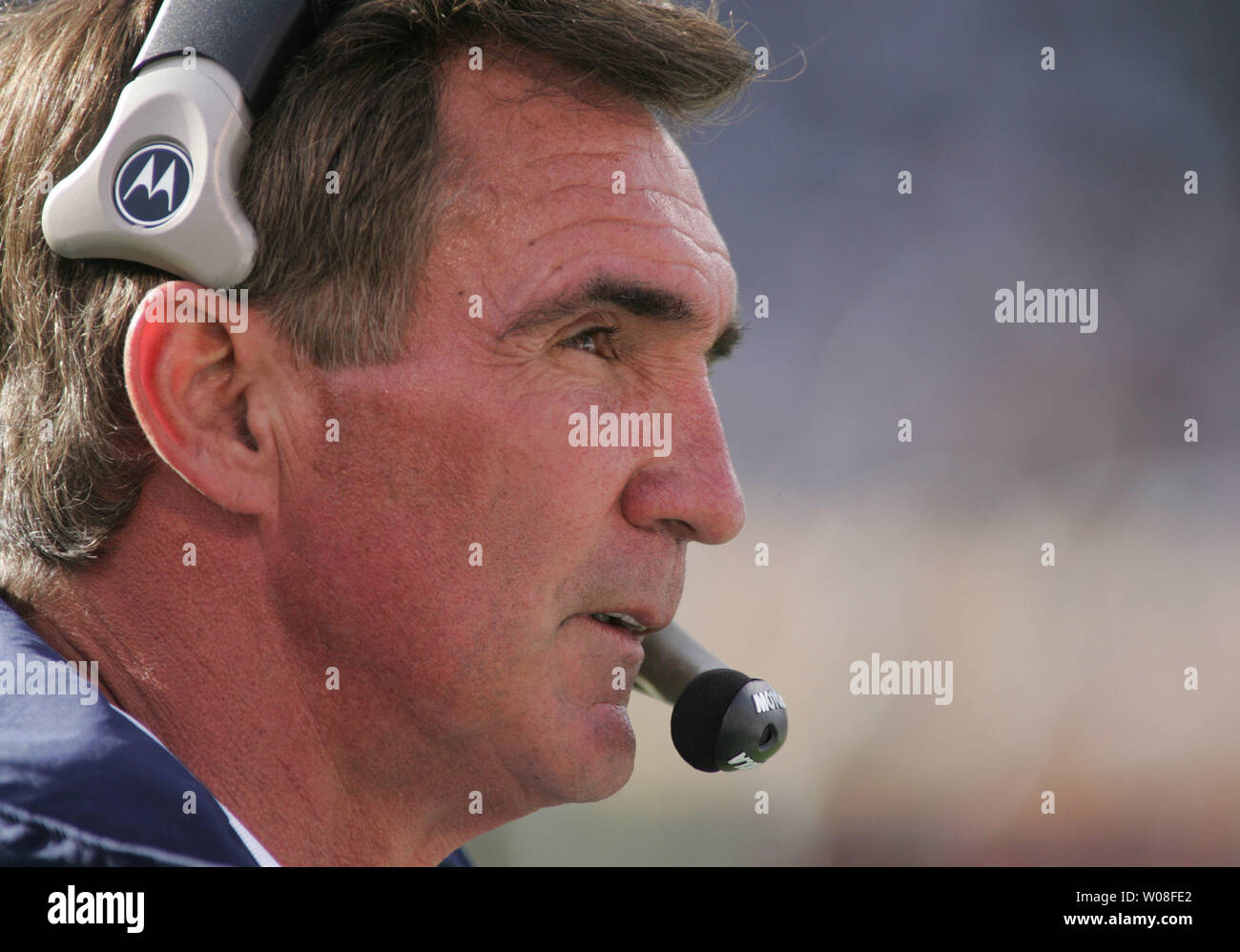Denver Broncos Head Coach Mike Shanahan watches his team play the ...