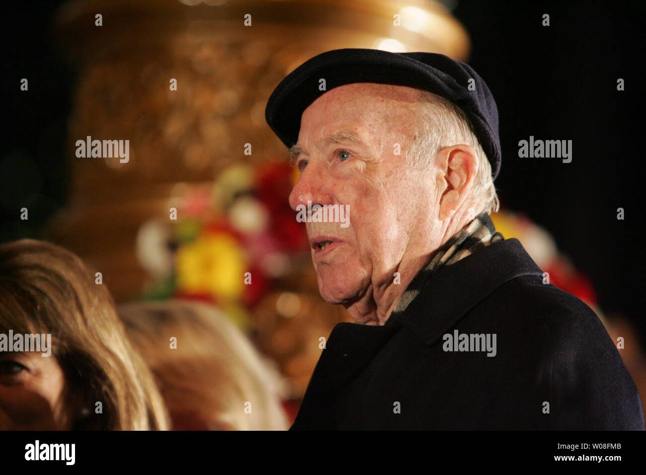 Former Secretary of State George Shultz stands in front of Lotta's ...
