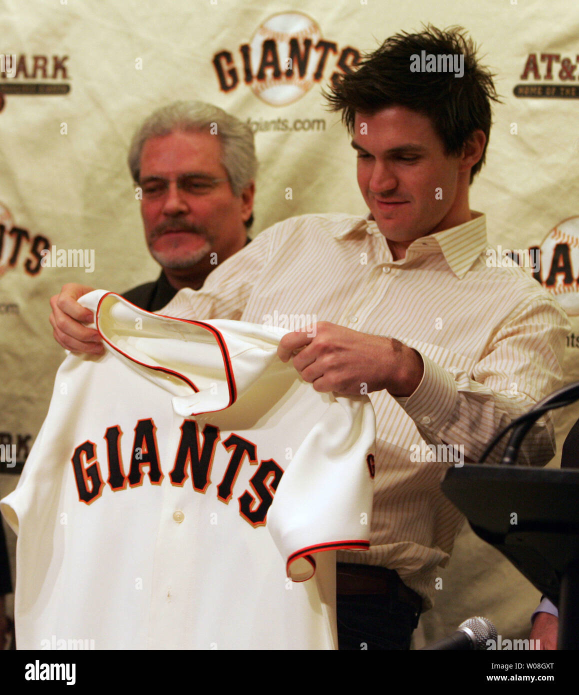 Newest San Francisco Giant Barry Zito checks out his new uniform as ...