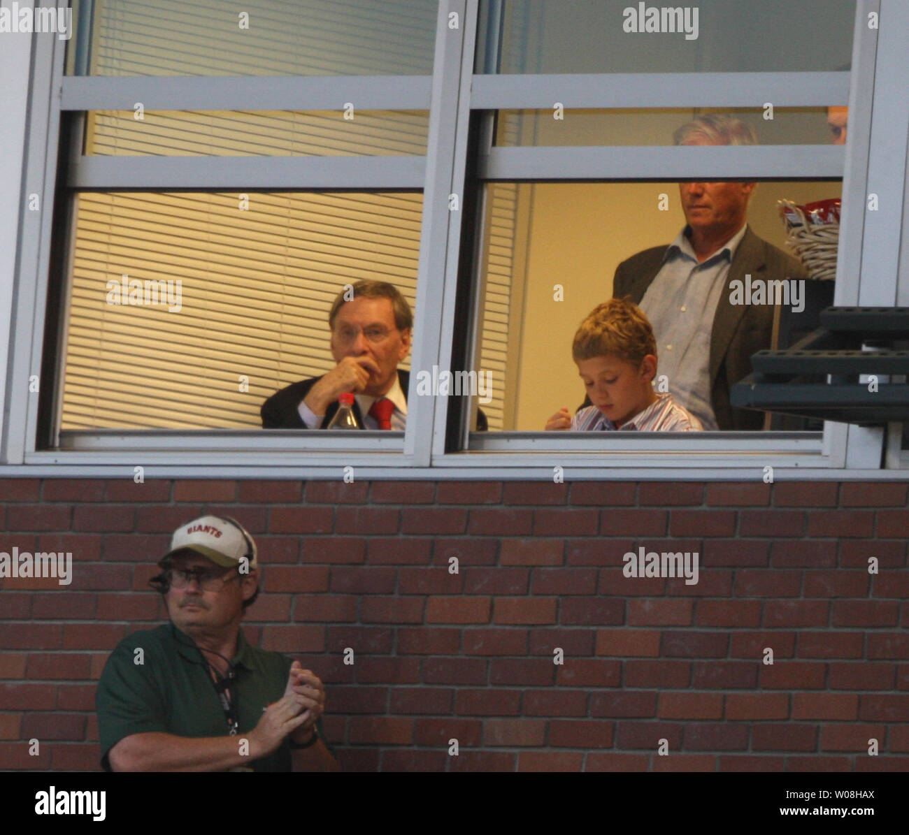 Commissioner of Baseball Bud Selig watches from a box as Barry Bonds ...