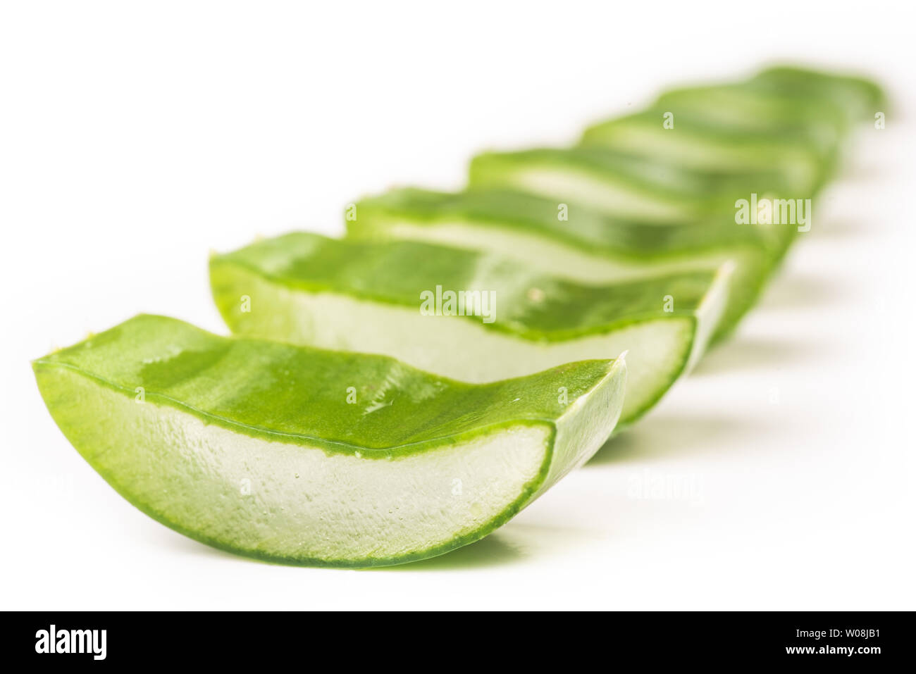 Cut aloe leaves on white background isolated Stock Photo - Alamy
