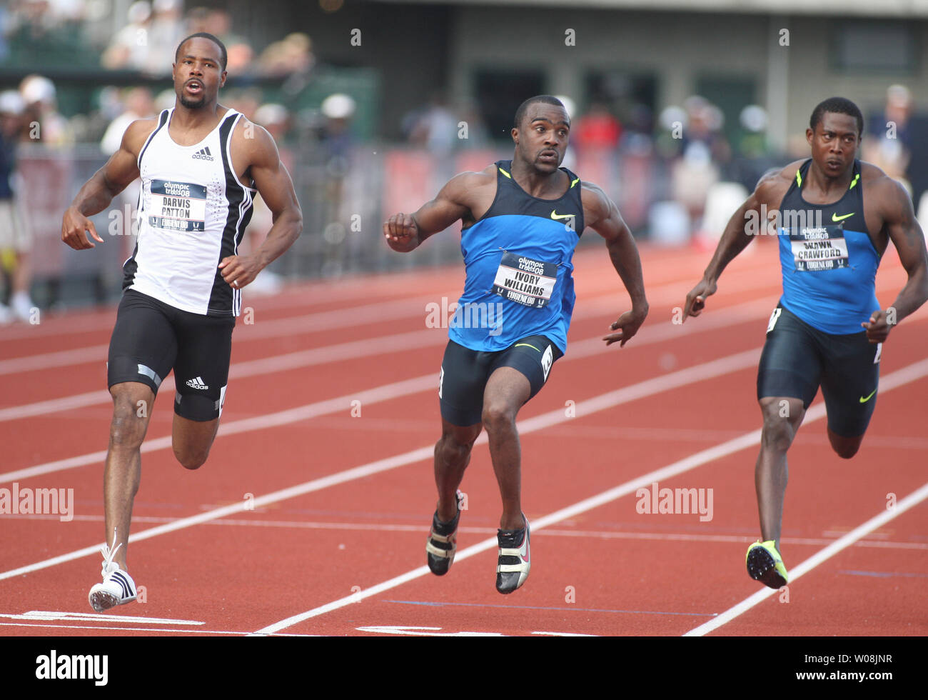 U.S. sprinter Darvis Patton (L) edges out Ivory Williams (C) and Shawn ...