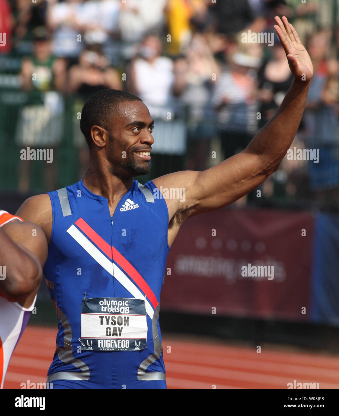 Tyson Gay (waves to the crowd after winning the 100m final at the U.S ...
