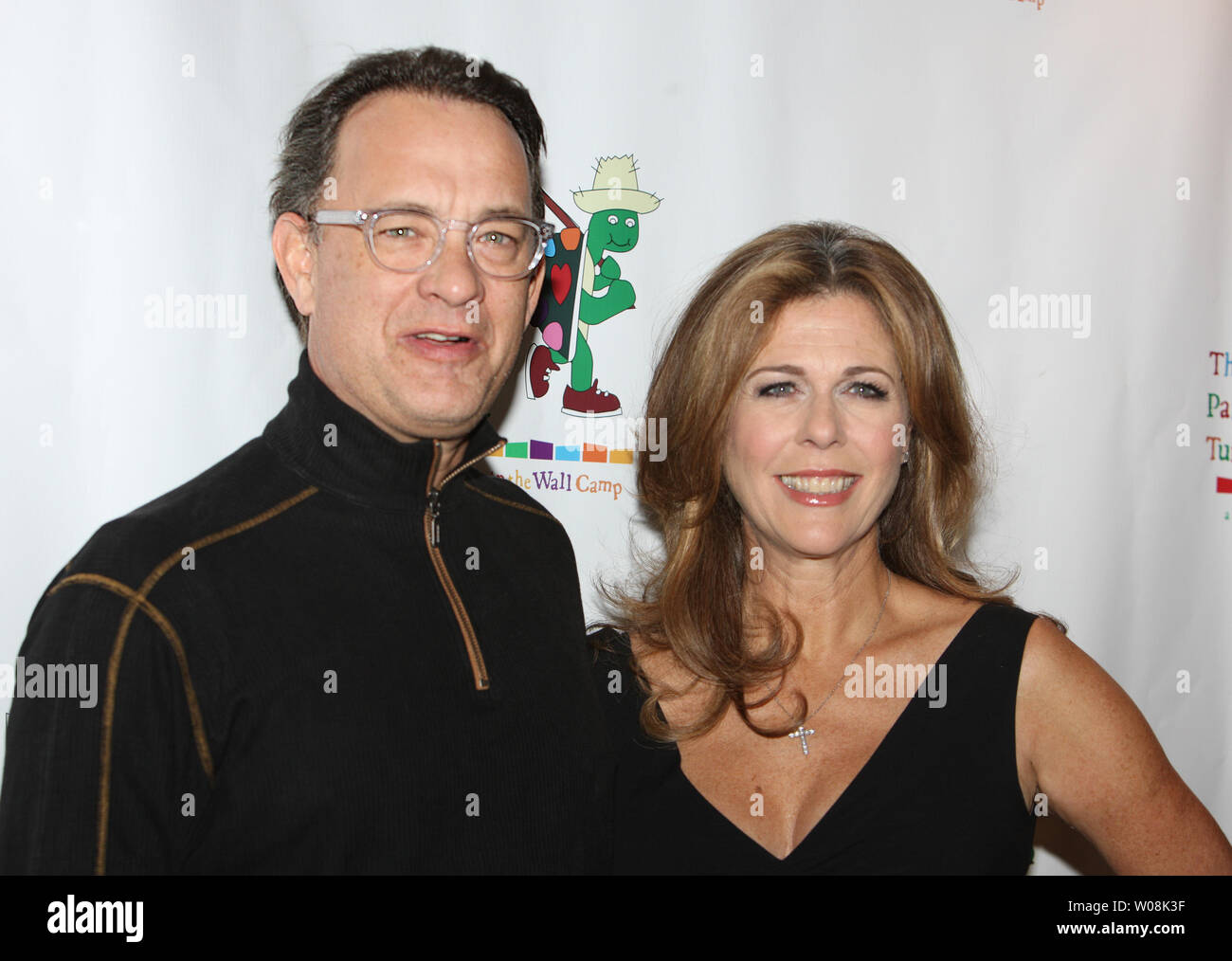 Tom Hanks and wife Rita Wilson arrive to participate in a staged ...
