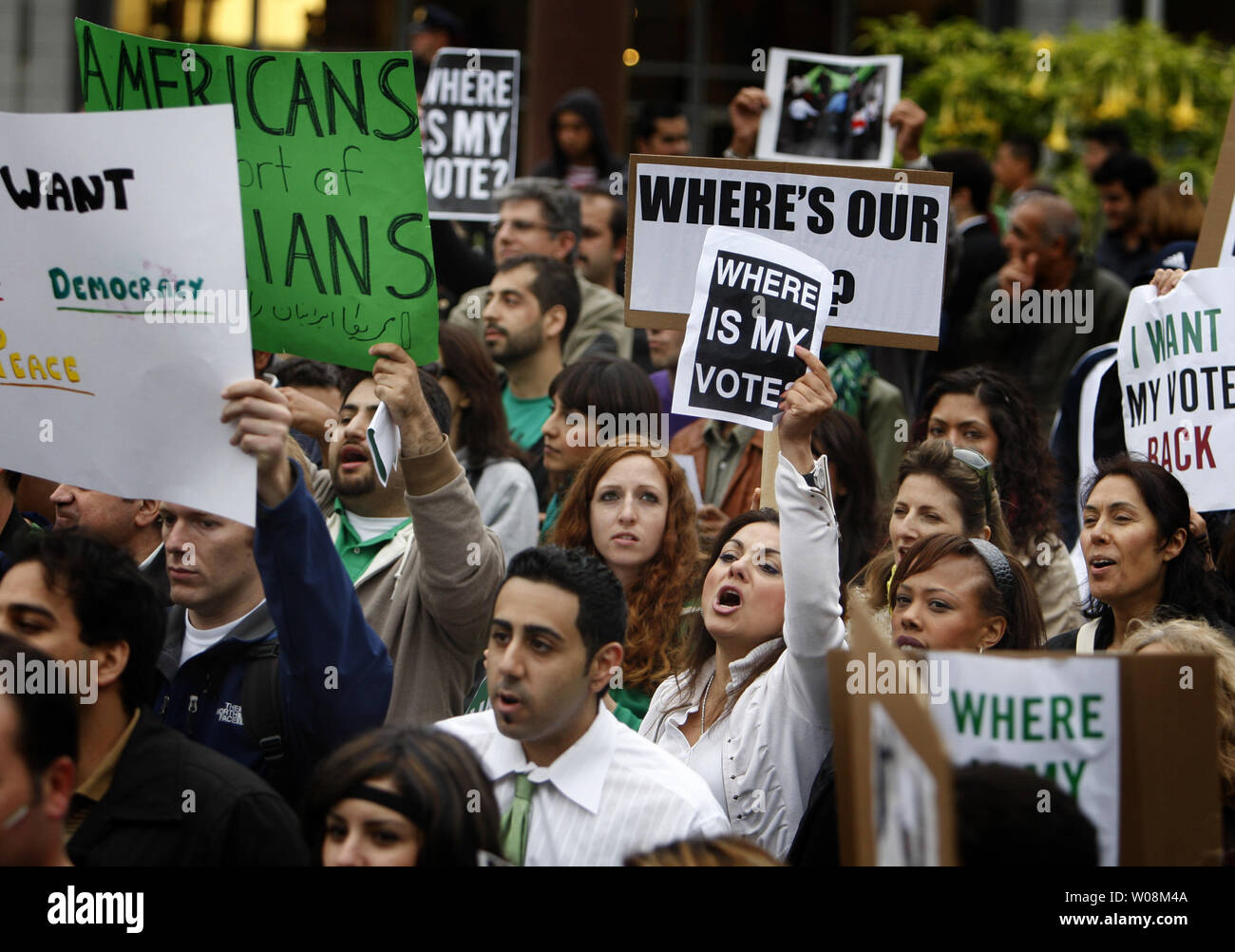 Iranian-American demonstrators shout at an evening rally supporting ...