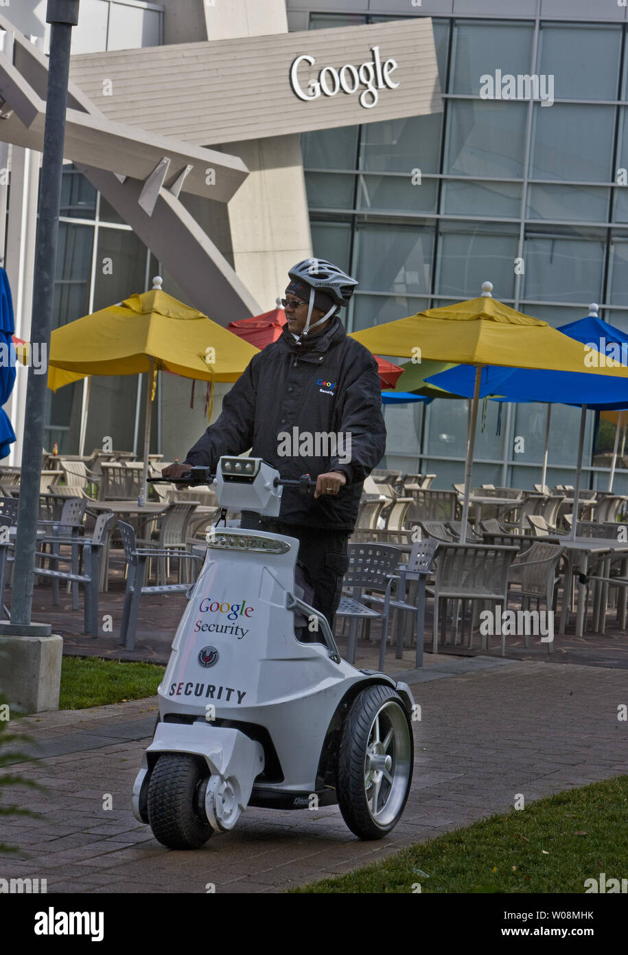 A security guard patrols the Googleplex in Mountain View, California on ...