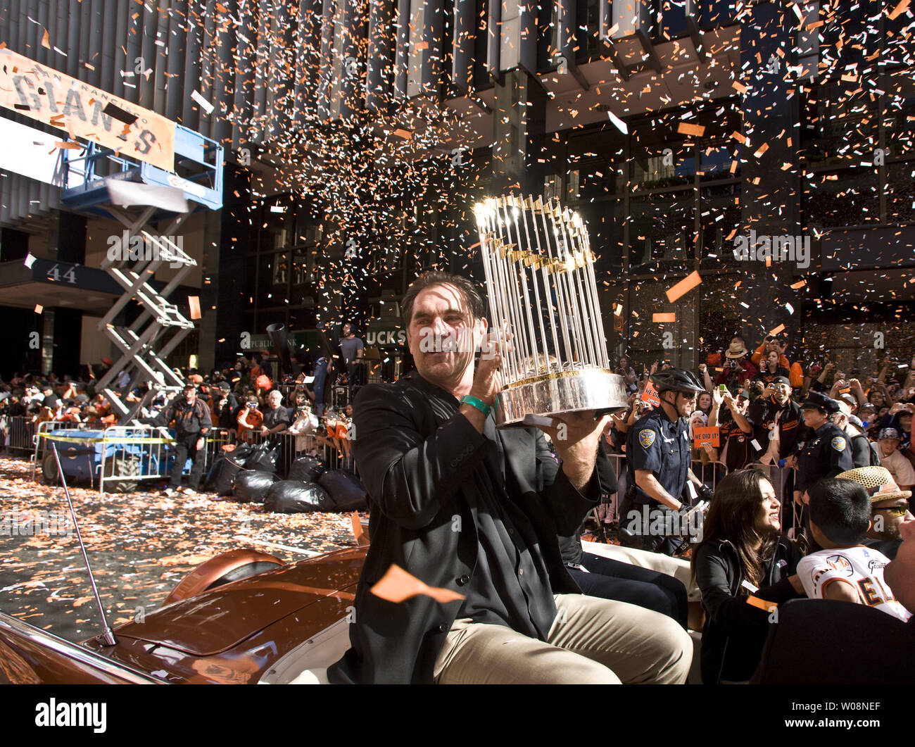 San Francisco Giants Manager Bruce Bochy holds the World Series Trophy ...
