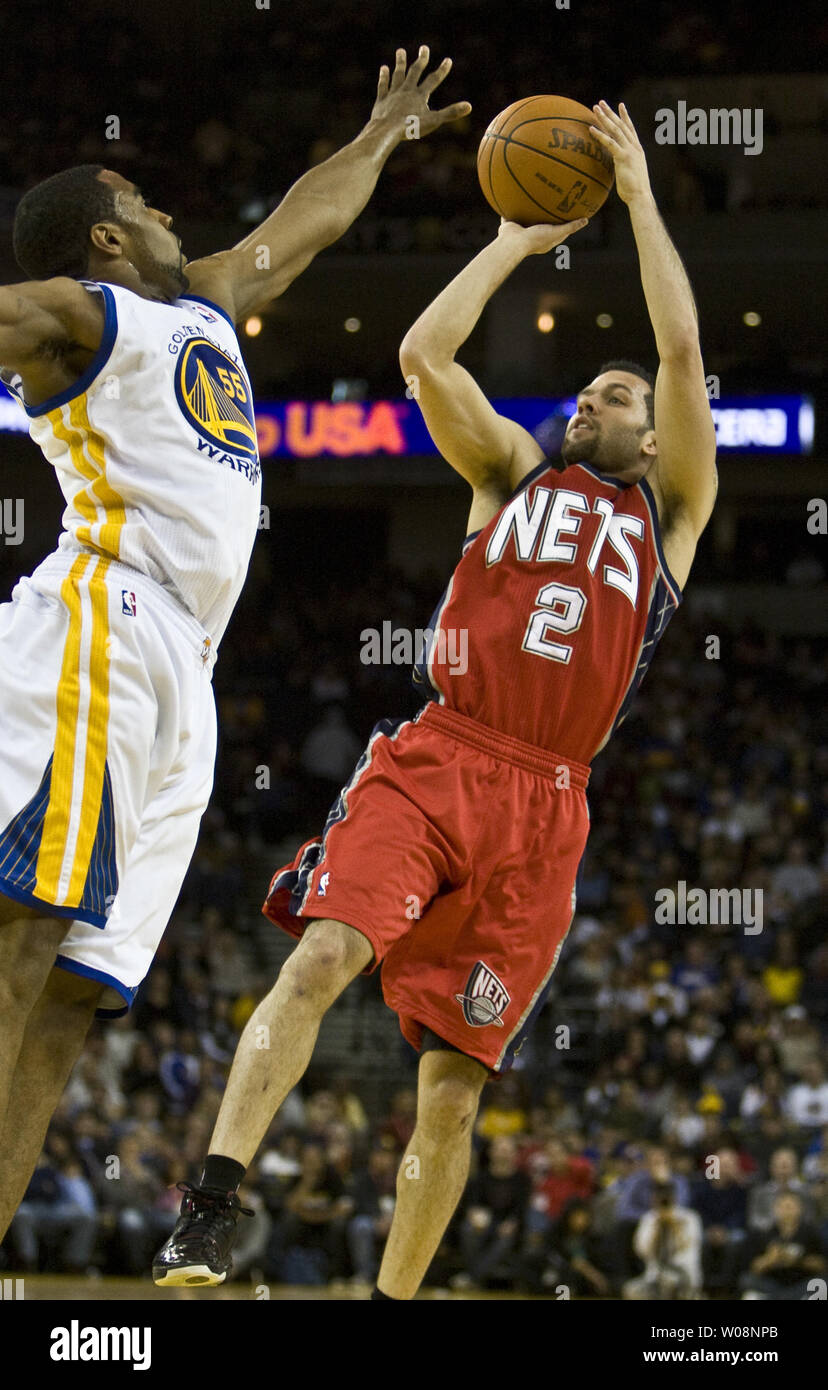 New Jersey Nets Jordan Farmar (2) takes a fade away against Golden ...
