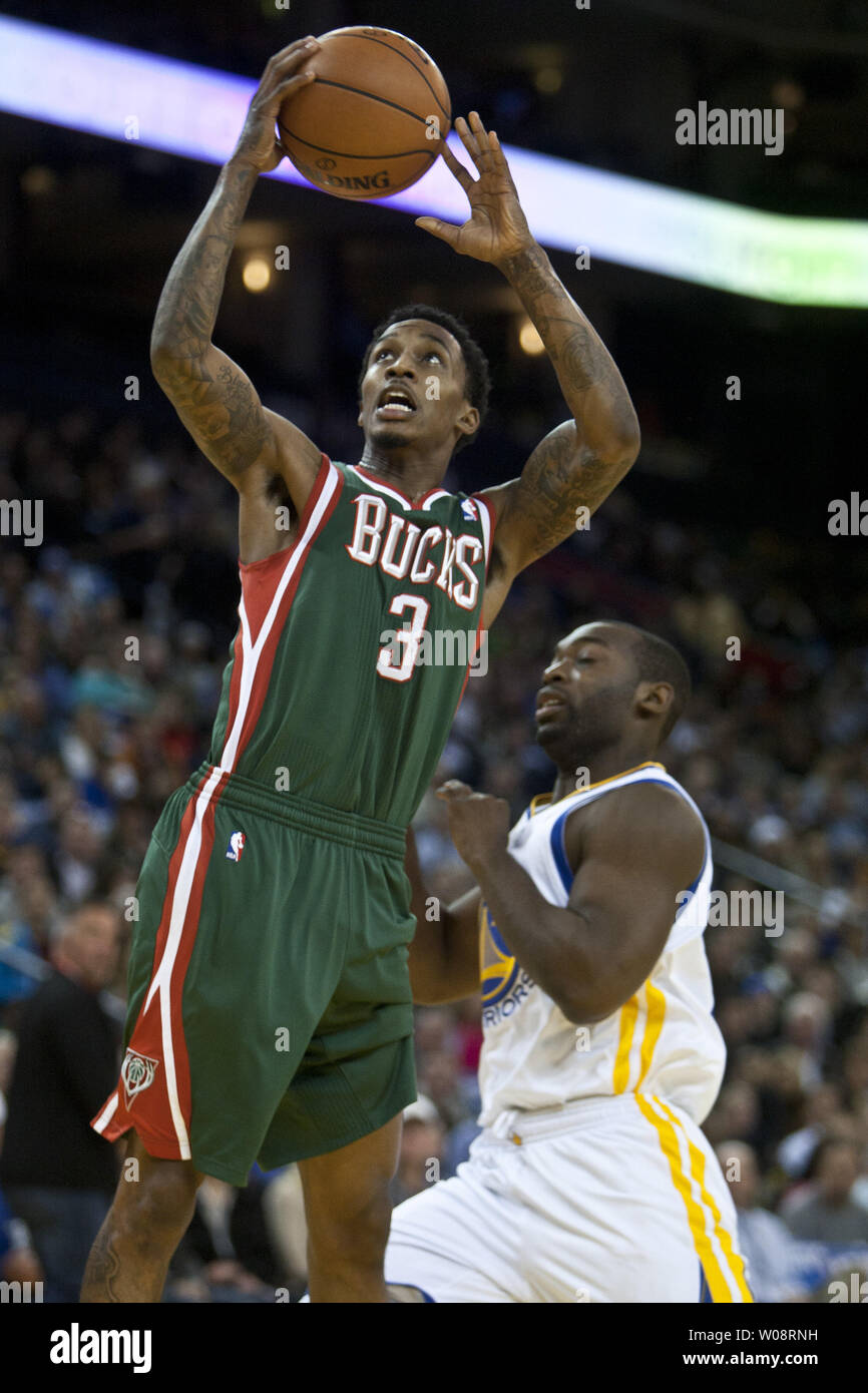 Milwaukee Bucks Brandon Jennings in front of Golden State Warriors ...