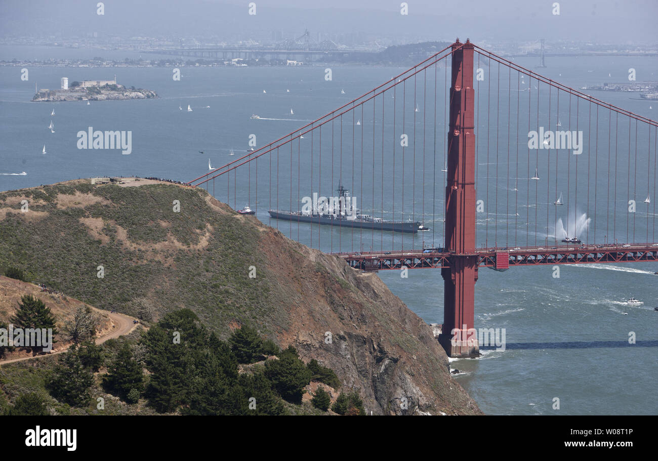 The battleship USS Iowa is towed toward the Golden Gate Bridge in San ...