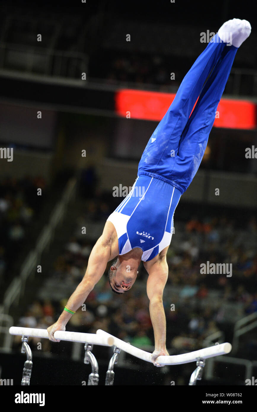 Danell Leyva performs his routine on the parallel bars at the US ...