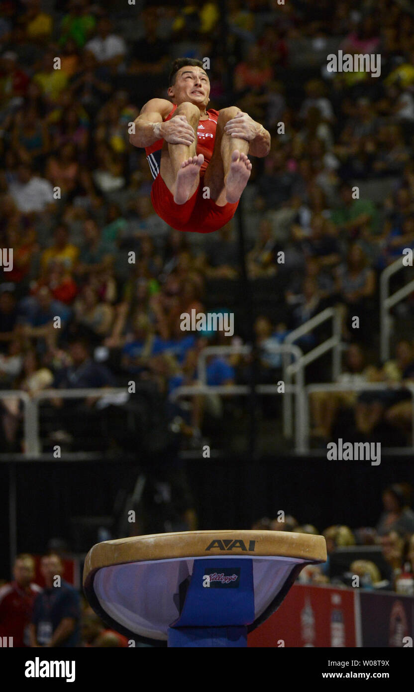 Brandon Wynn makes his vault at the US Olympic trials in gymnastics at ...