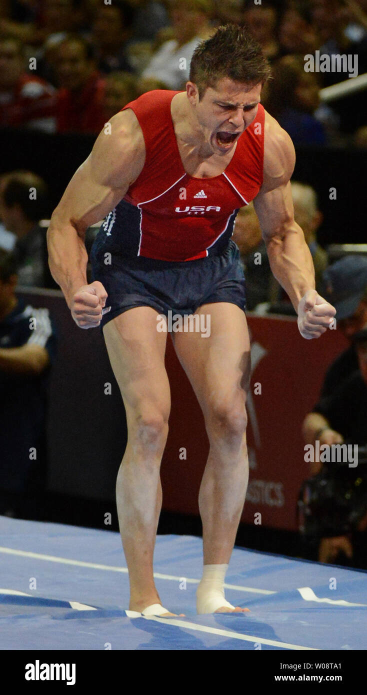 Chris Brooks celebrates sticking the landing on his vault at the US ...