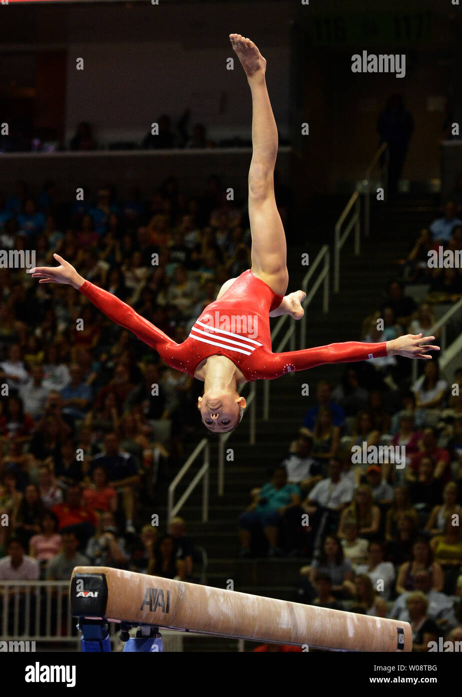 Kyla Ross performs on the beam at the US Olympic trials in gymnastics ...