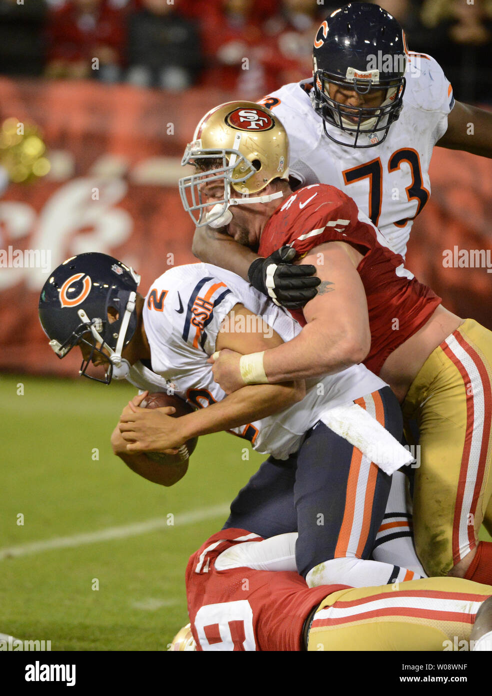 Chicago Bears QB Jason Campbell (2) is sacked by San Francisco 49ers ...