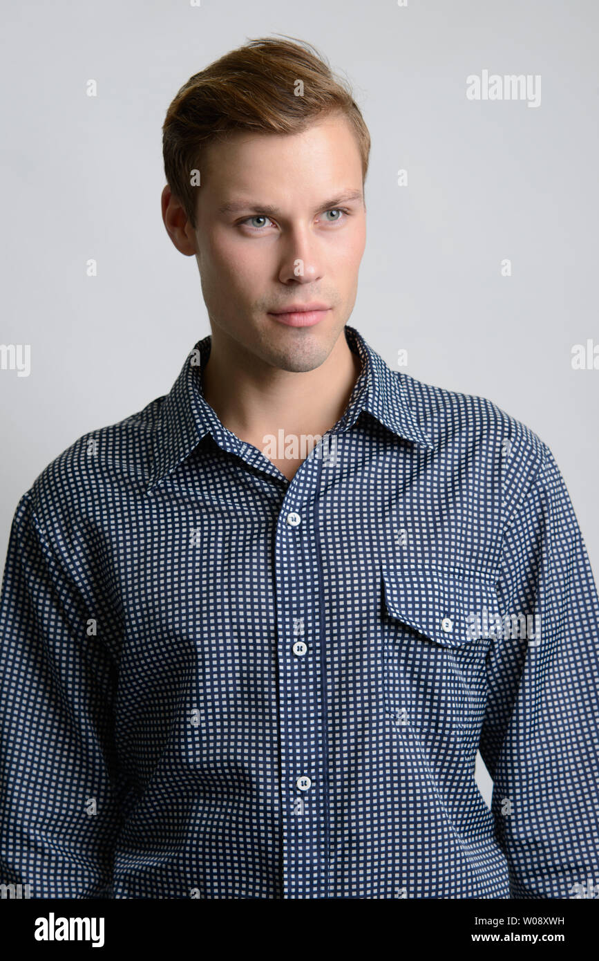 A Brown hair Caucasian male model poses in vintage clothing outfit, a ...