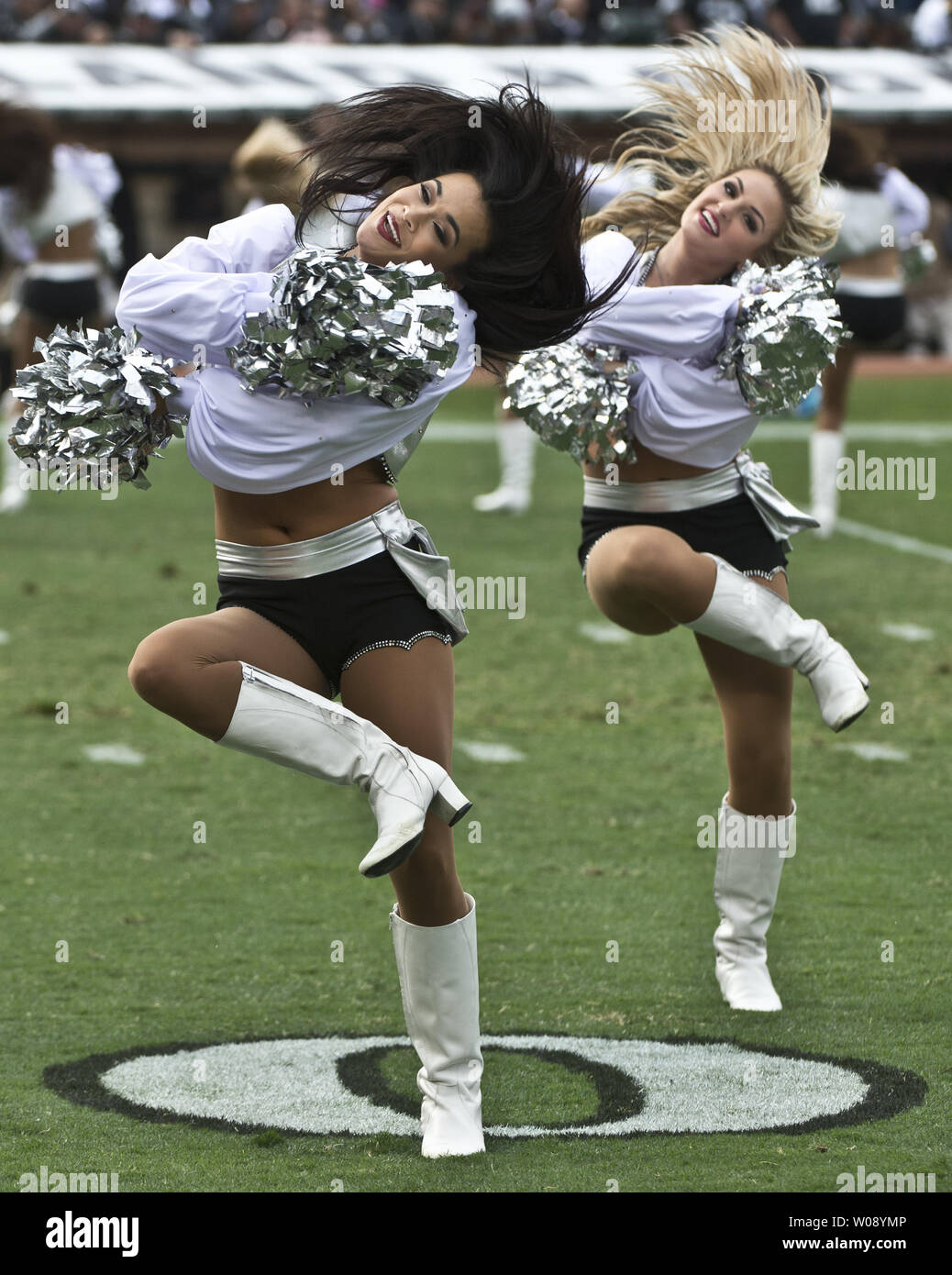 Oakland Raiderettes perform during a time out as the Oakland Raiders ...