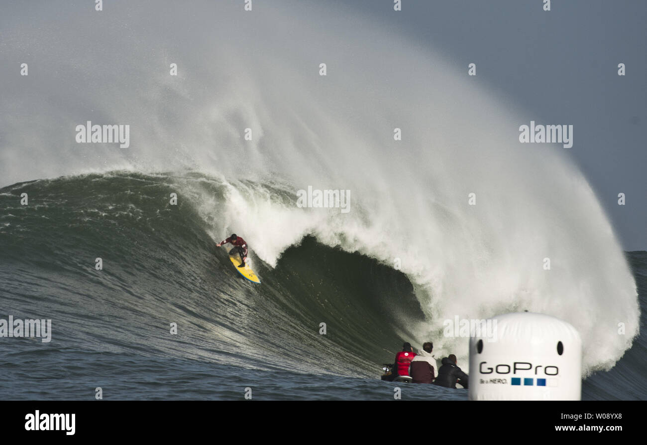 Jamie Sterling rides a wave in the first heat of the Mavericks ...