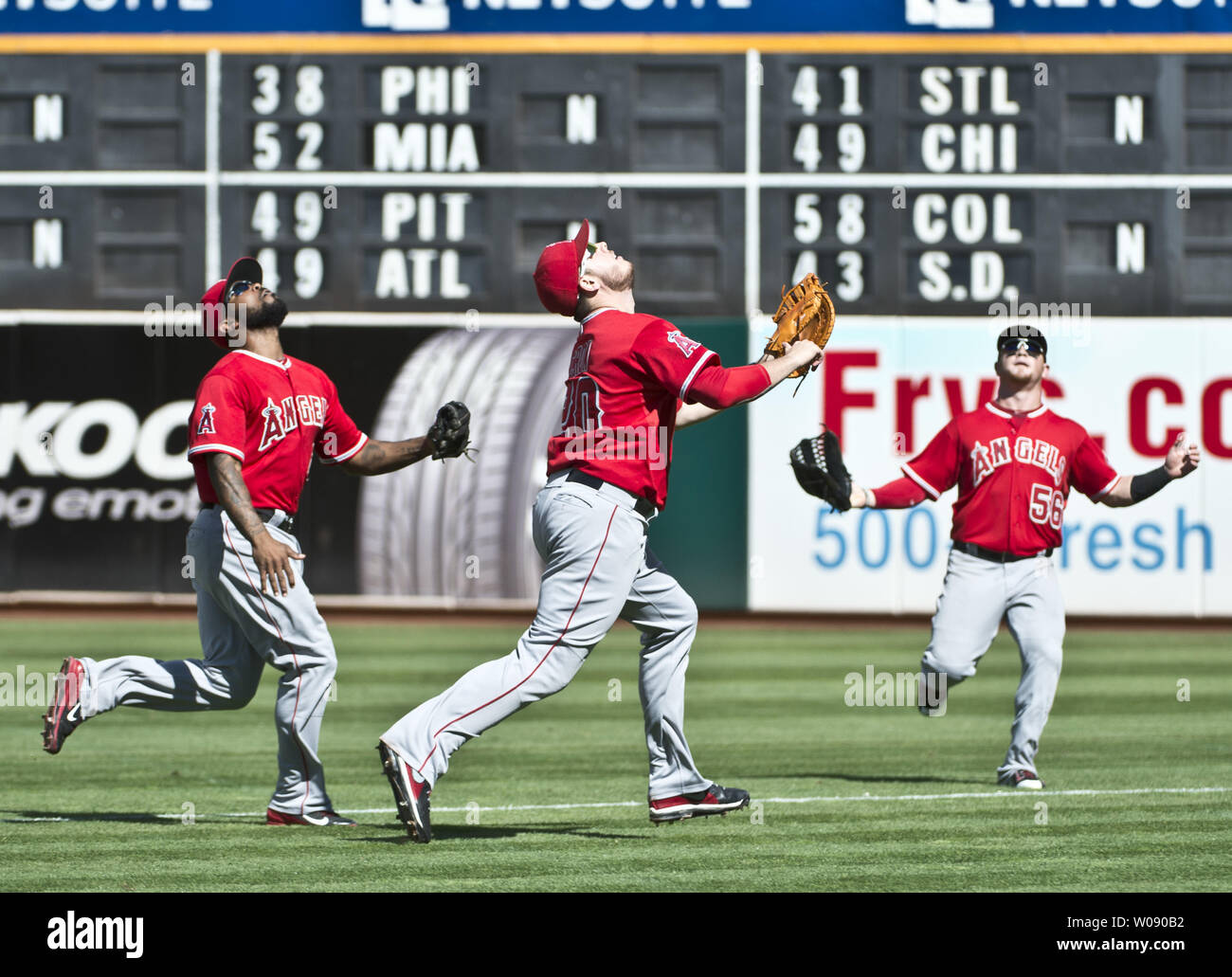 Los Angeles Angels (L -R) Howie Kendrick, C.J. Cron and Kole Calhoun ...