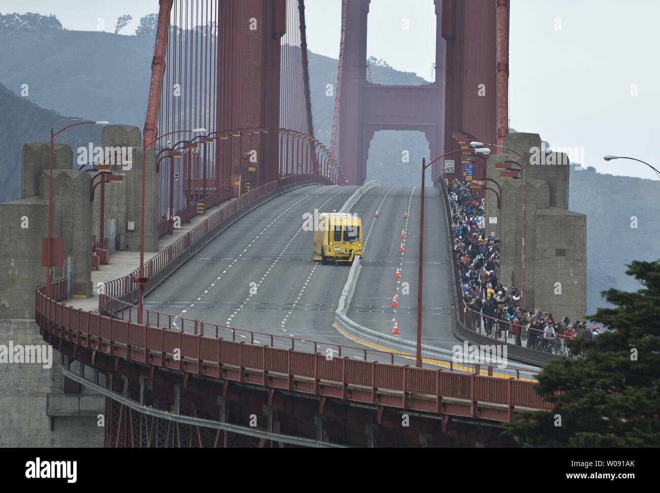A "Road Zipper" truck tests changing lanes of a new road barrier on the ...