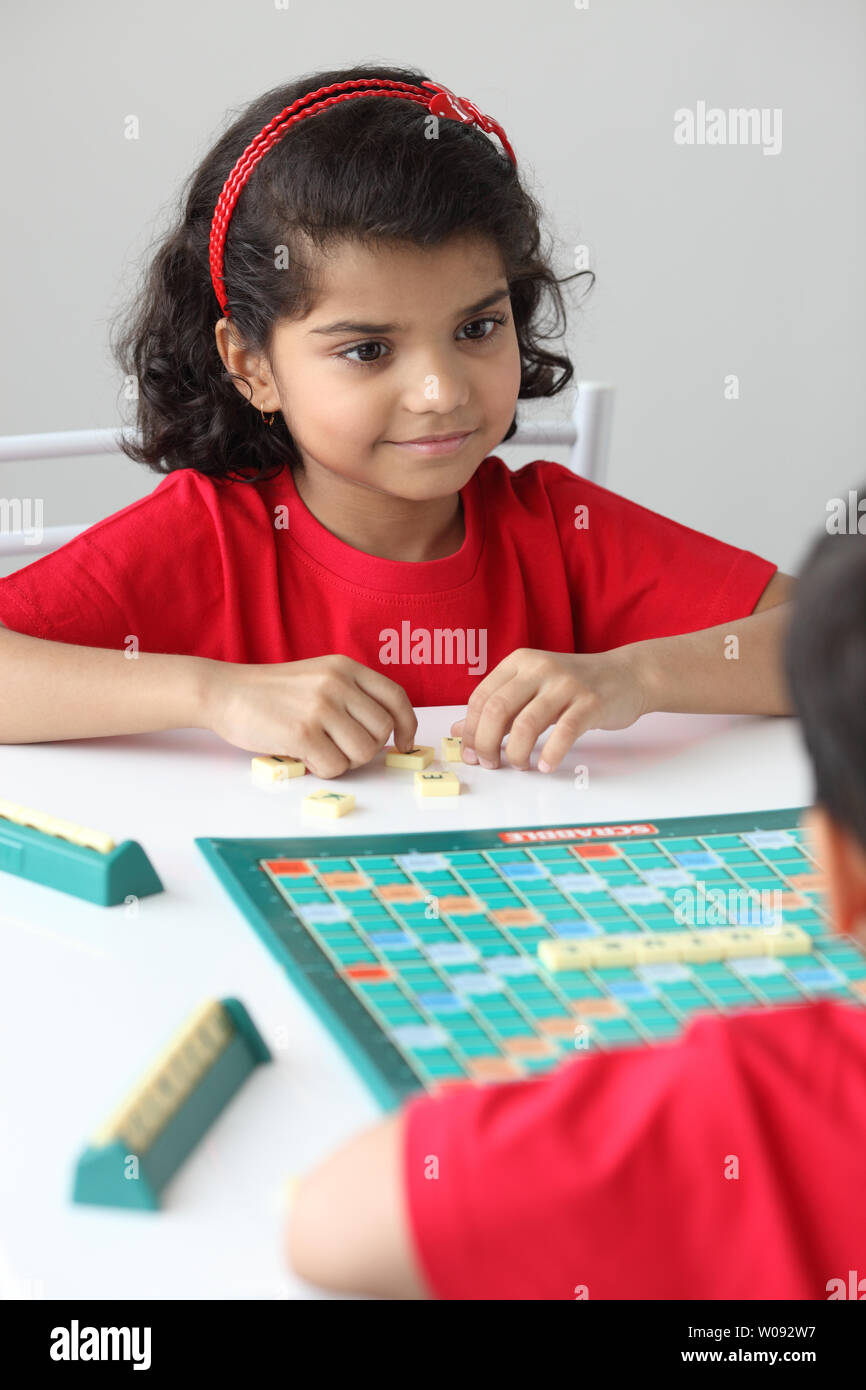 Two friends playing word game Stock Photo - Alamy